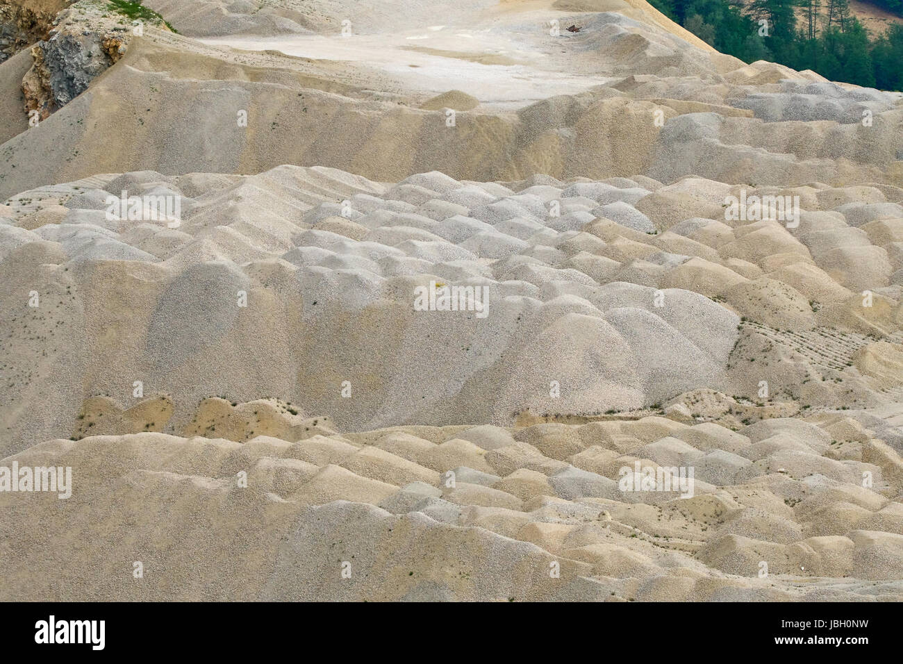 Landscape with a large stone quarry in full development Stock Photo - Alamy