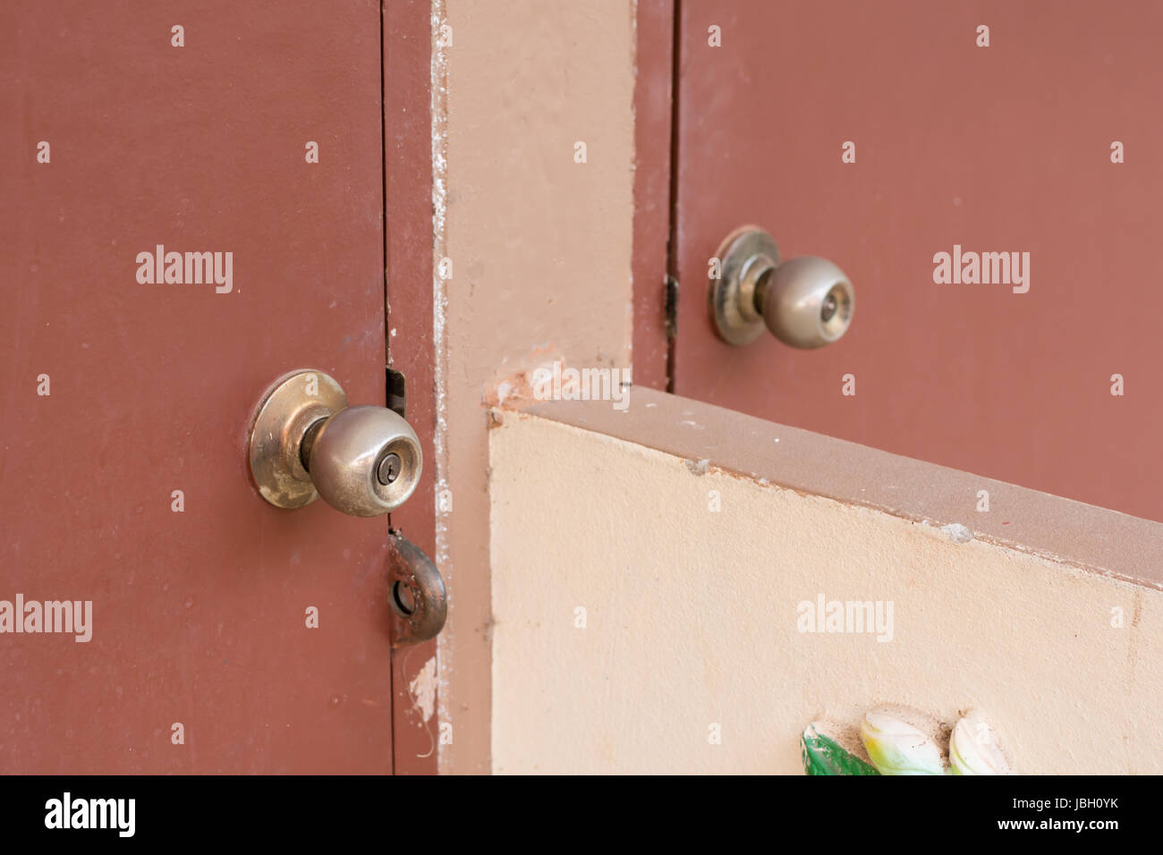 Door knob and keyhole made of brass on the old wooden door Stock Photo ...