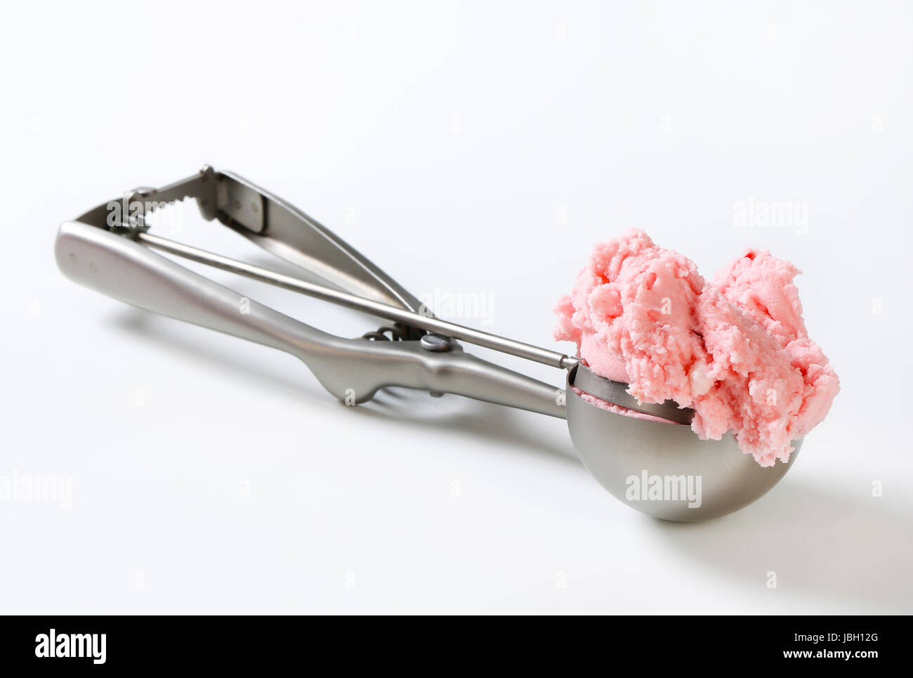 Scoop of pink ice cream - studio shot Stock Photo - Alamy