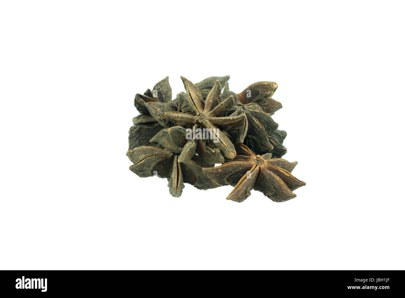 Star anise spice fruits and seeds isolated on white background closeup ...