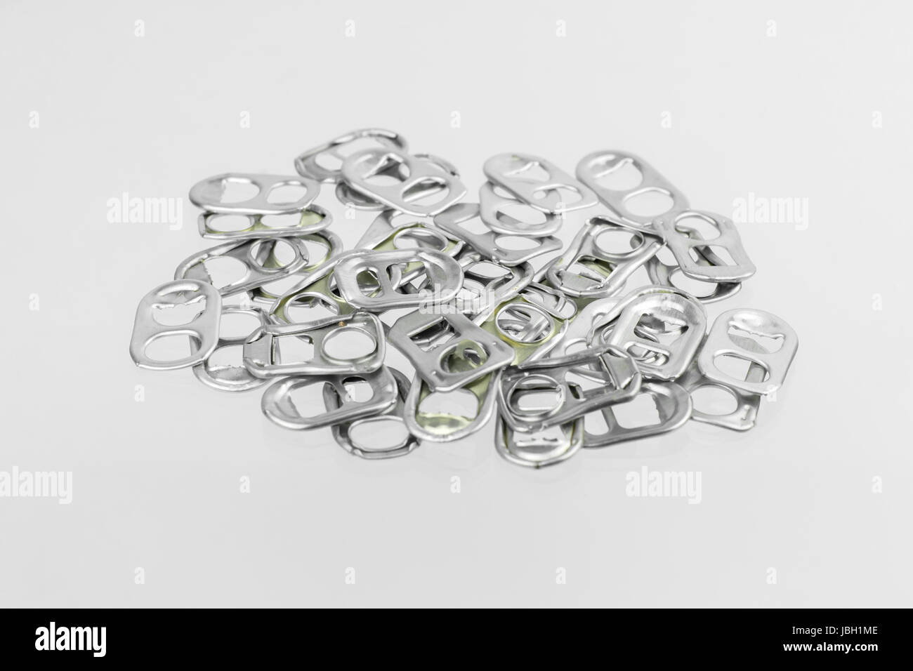 Ring pull aluminum of cans on white background Stock Photo - Alamy