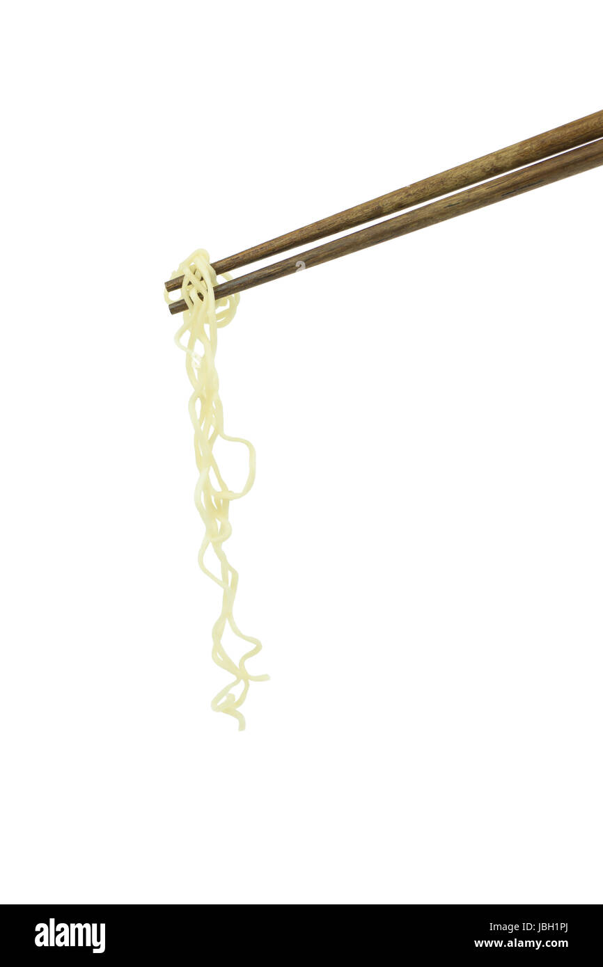 chopsticks holding oriental noodles isolated on a white background ...