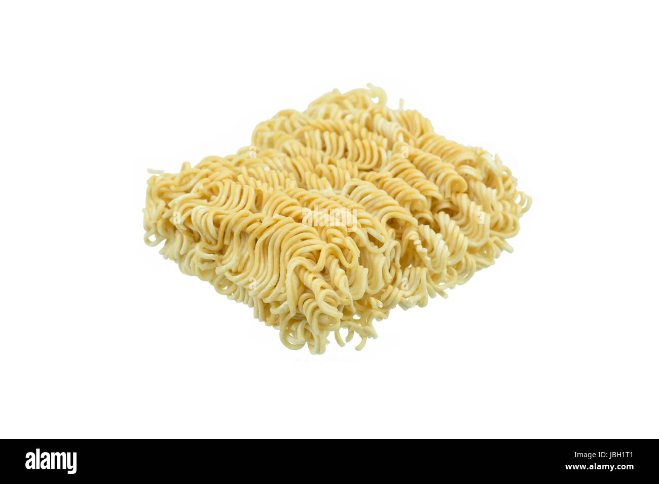 piece of instant noodles on paper isolated white background Stock Photo ...