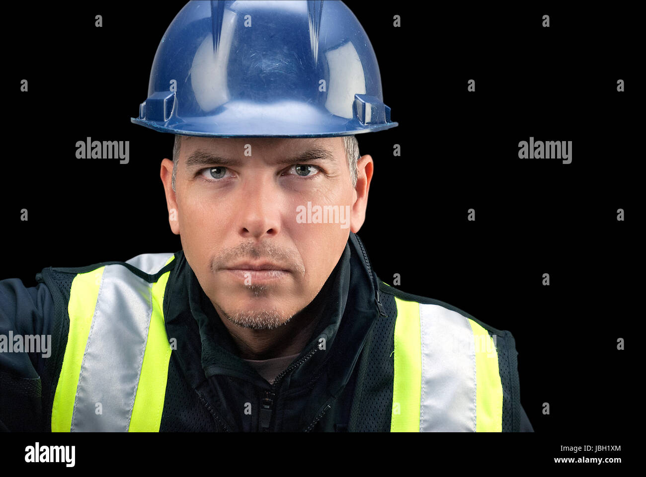 Close-up of a construction worker looking to camera Stock Photo - Alamy