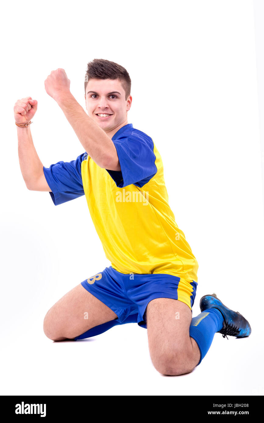 Football player celebrating a goal isolated in white Stock Photo - Alamy