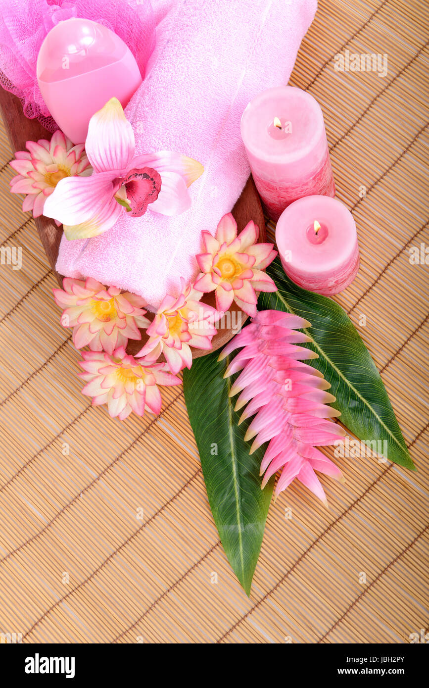 Spa setting in pink tone isolated in white Stock Photo - Alamy
