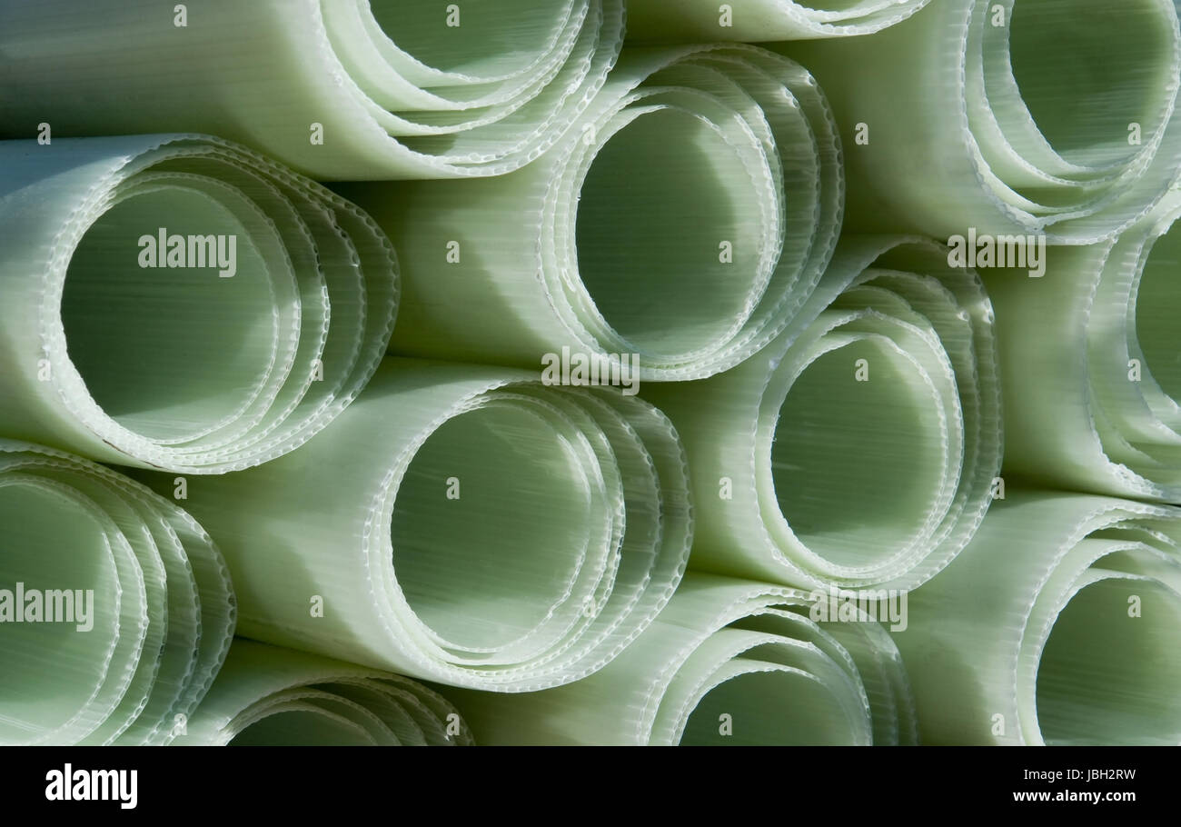 detail of some sunny illuminated light green plastic rolls for ...