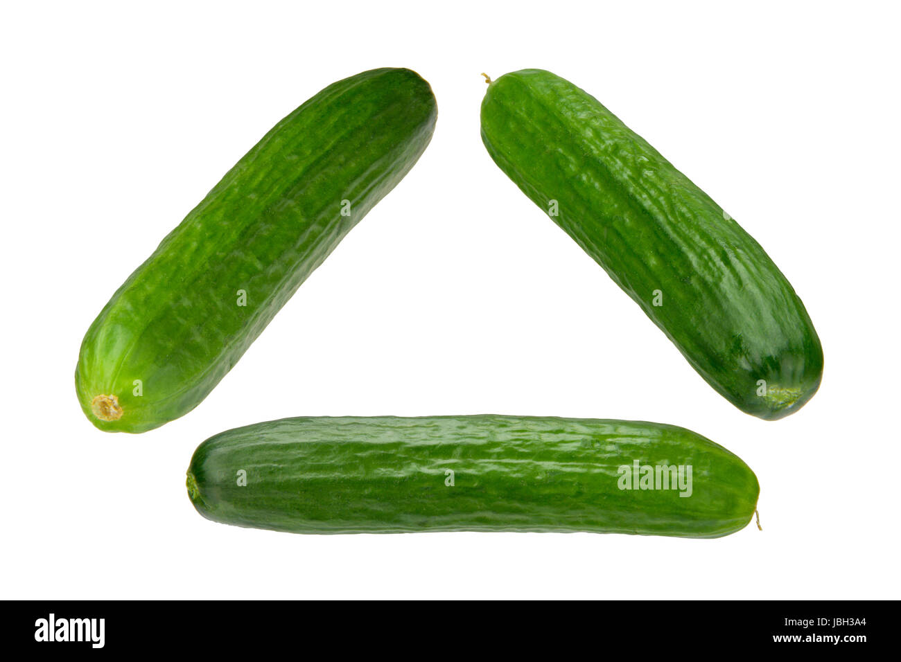 collection of three small cucumber isolated on the white background ...