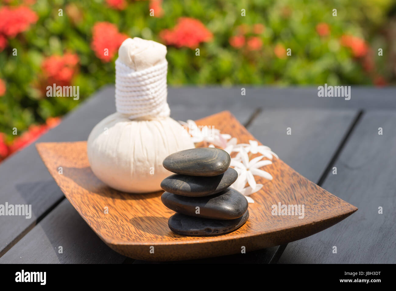 Outdoor Herbal Spa Massage in the garden Stock Photo - Alamy