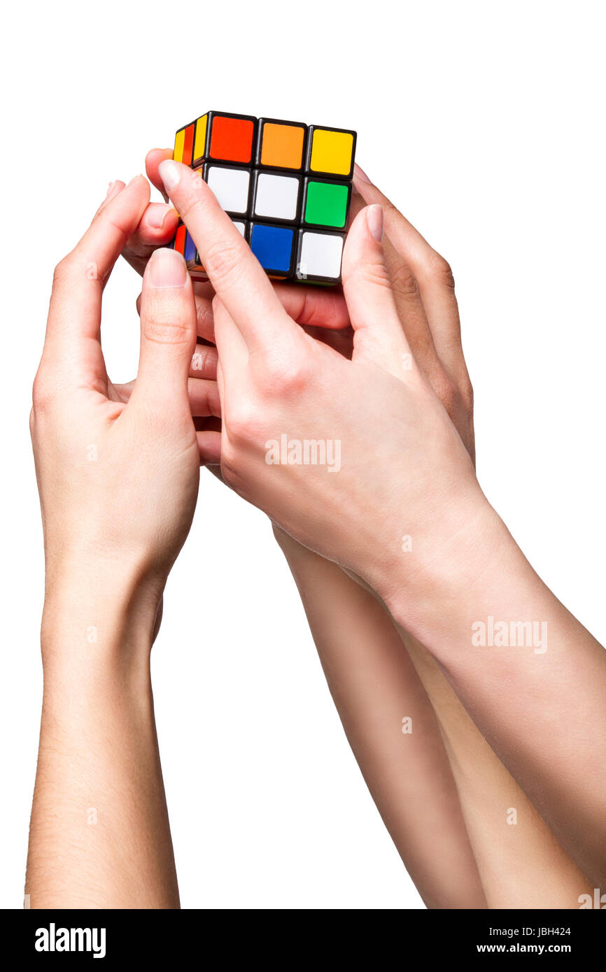 Rubik cube on hands hi-res stock photography and images - Alamy