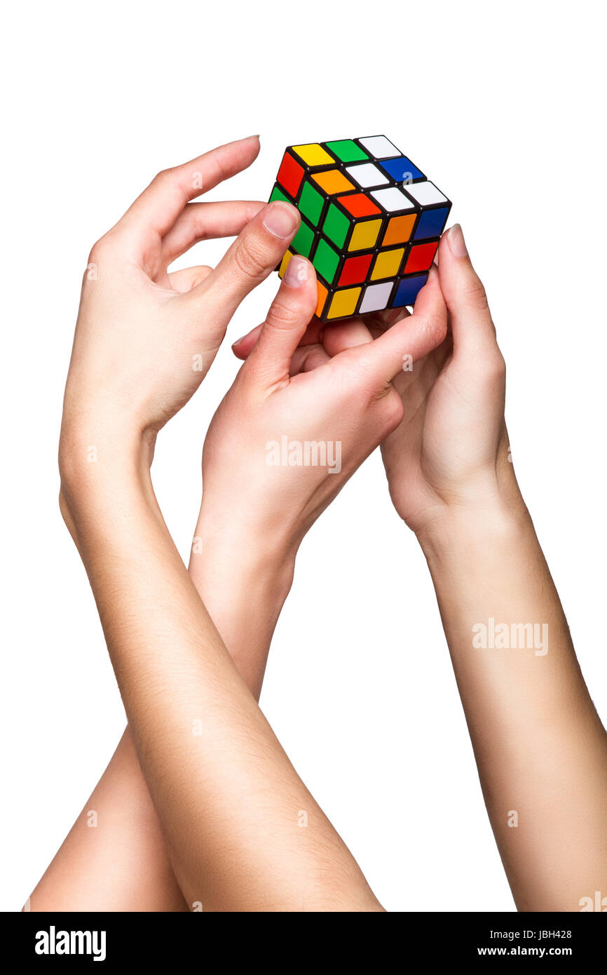 Rubik cube on hands hi-res stock photography and images - Alamy