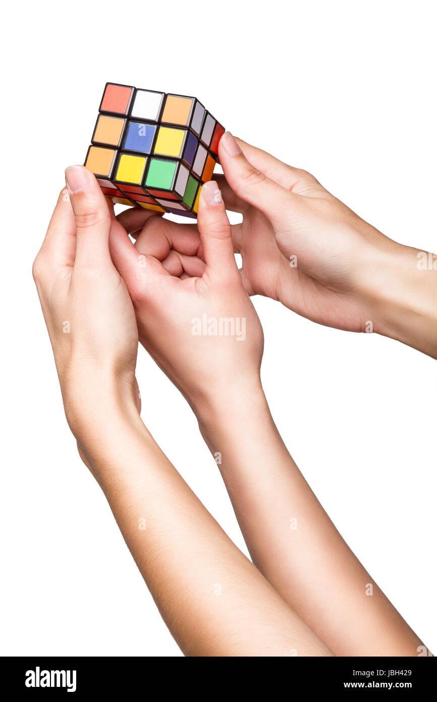 Rubik cube on hands hi-res stock photography and images - Alamy