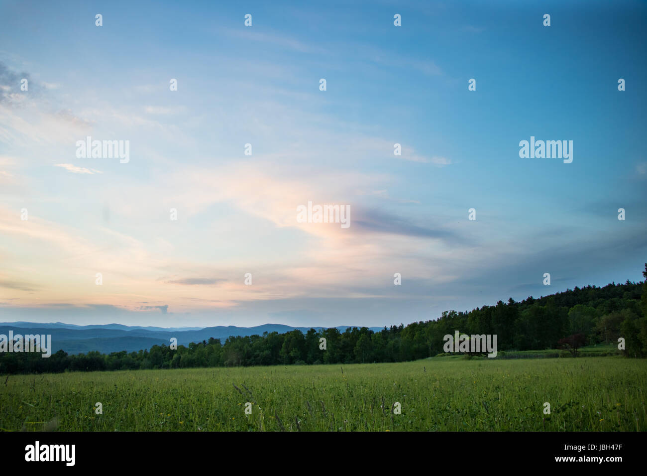 Sunset over meadow hi-res stock photography and images - Alamy