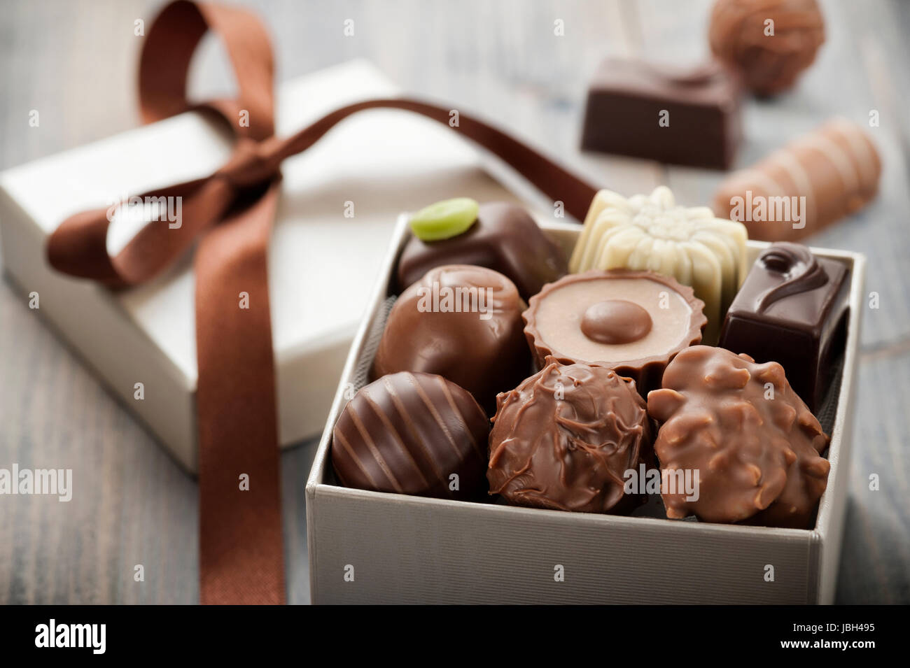 assorted chocolates confectionery in their gift box Stock Photo - Alamy