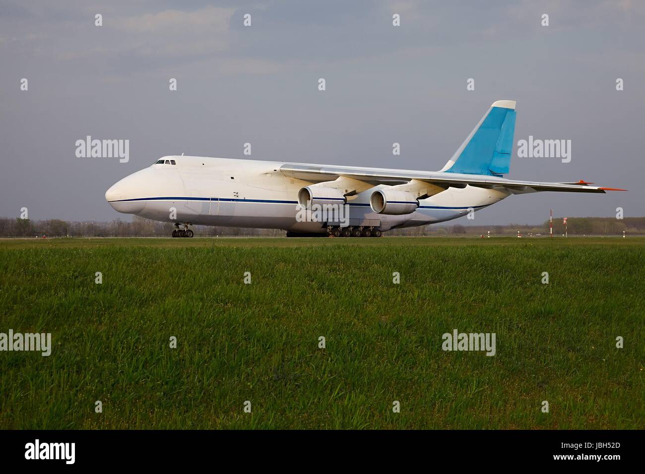 Huge cargo plane on the runway Stock Photo - Alamy