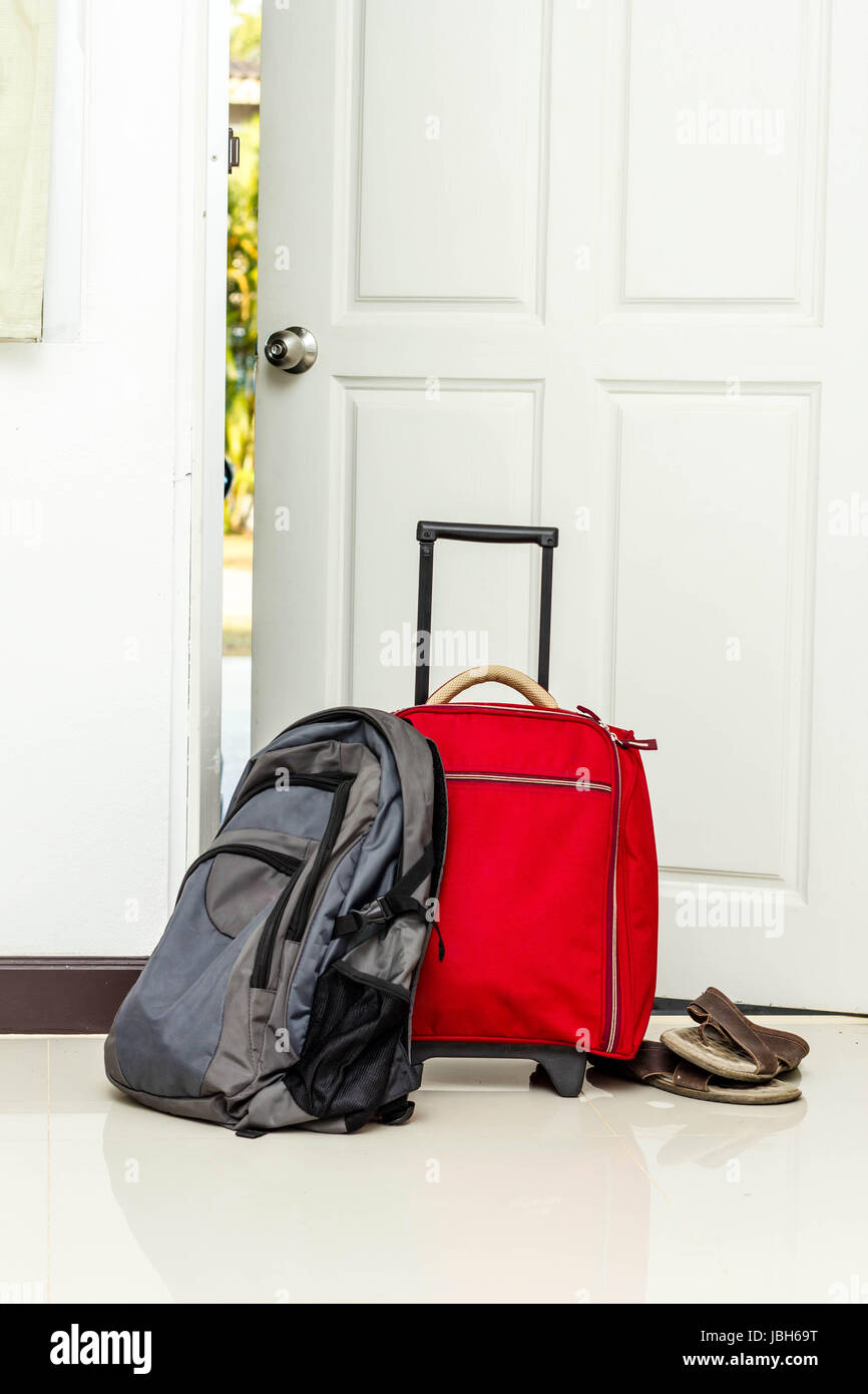 Front door house interior suitcase hi-res stock photography and images ...