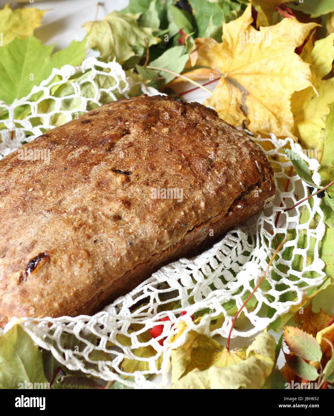 Loaf of bread and still life on rustic background Stock Photo - Alamy