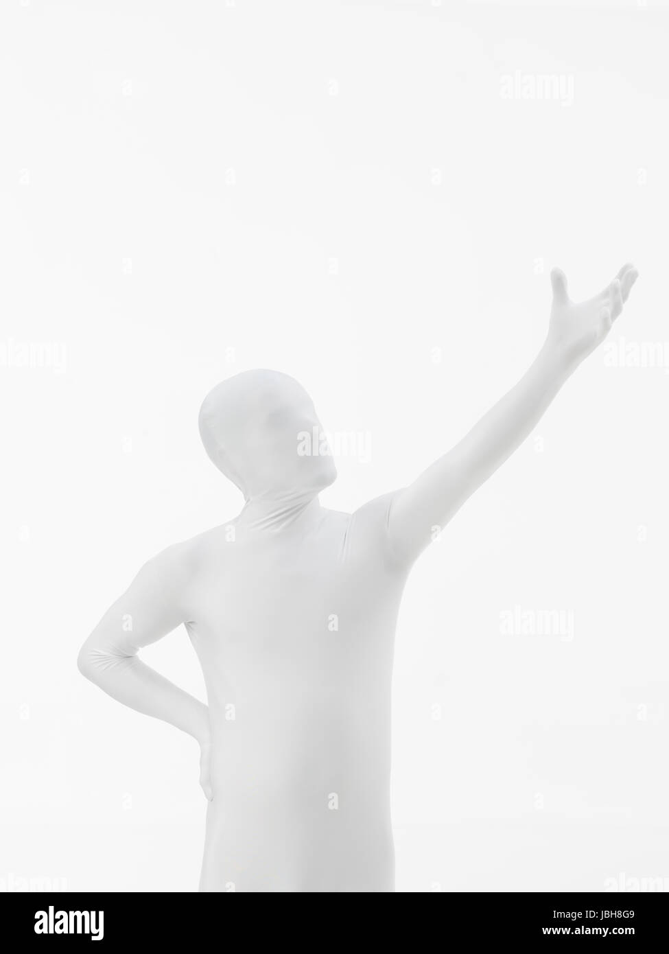 Faceless man dressed in white hi-res stock photography and images - Alamy