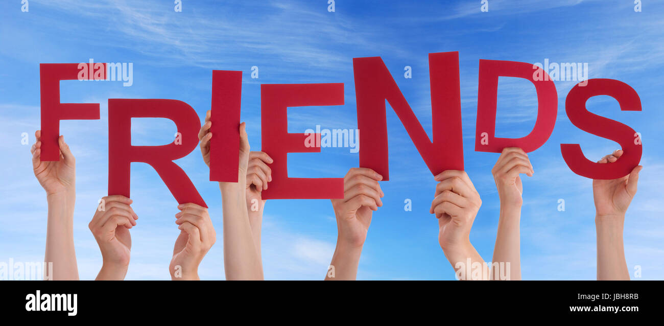Many Hands Holding the Red Word Friends in the Sky Stock Photo - Alamy
