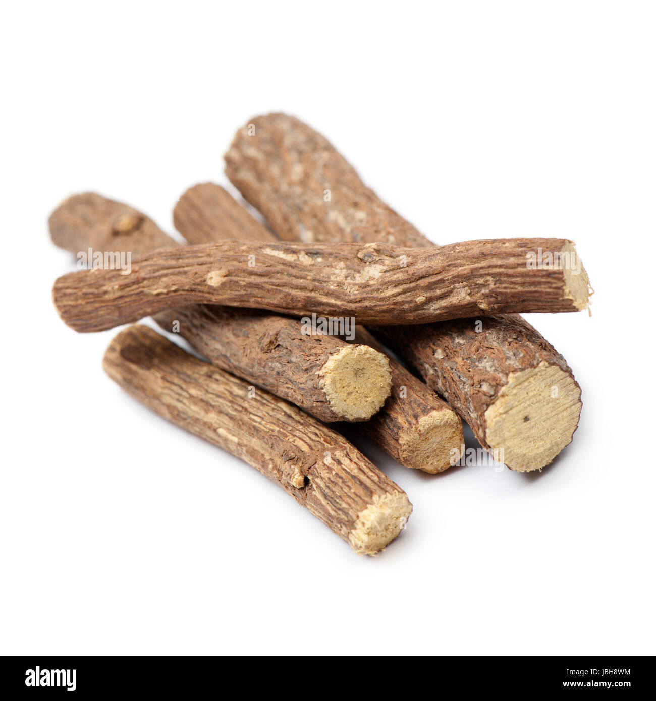 liquorice root, on white background Stock Photo - Alamy