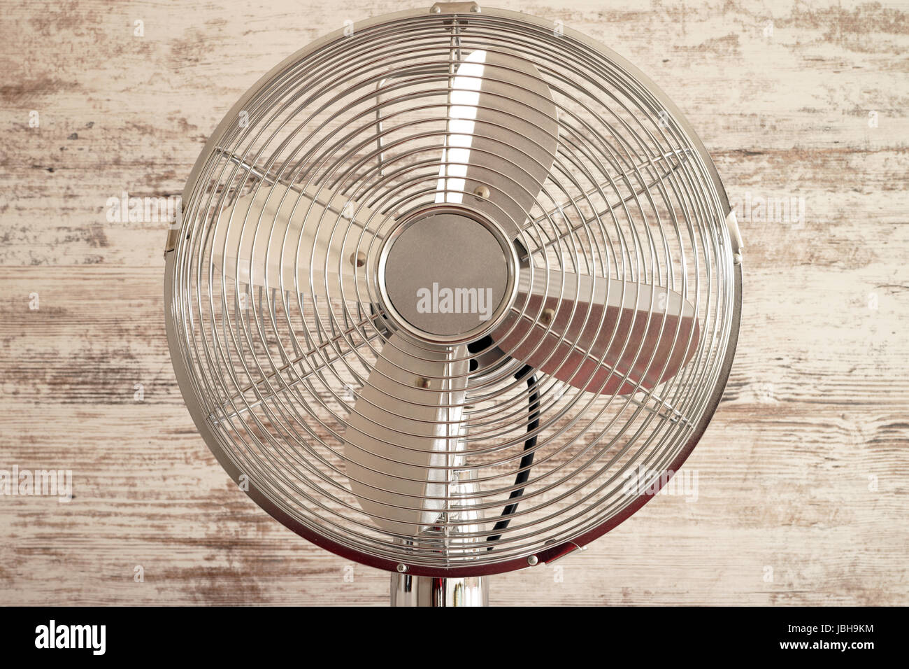 silver colored table fan Stock Photo - Alamy