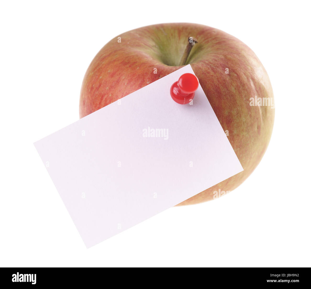 Apple with a blank piece of paper isolated over a white background ...