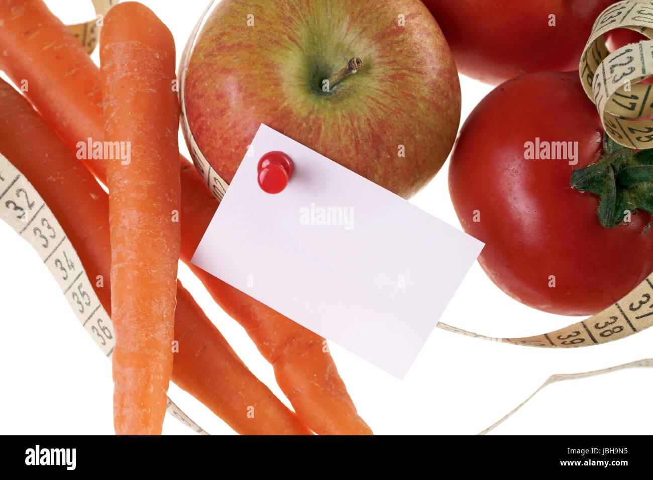 fresh fruits and vegetables with measure tape and empty note Stock ...
