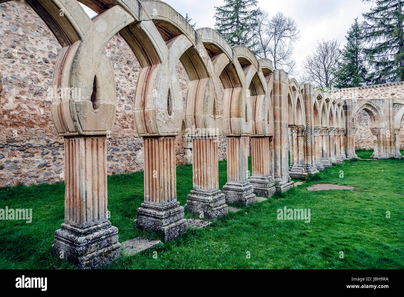 Intersecting arches in the courtyard of the Monastery of San Juan de ...