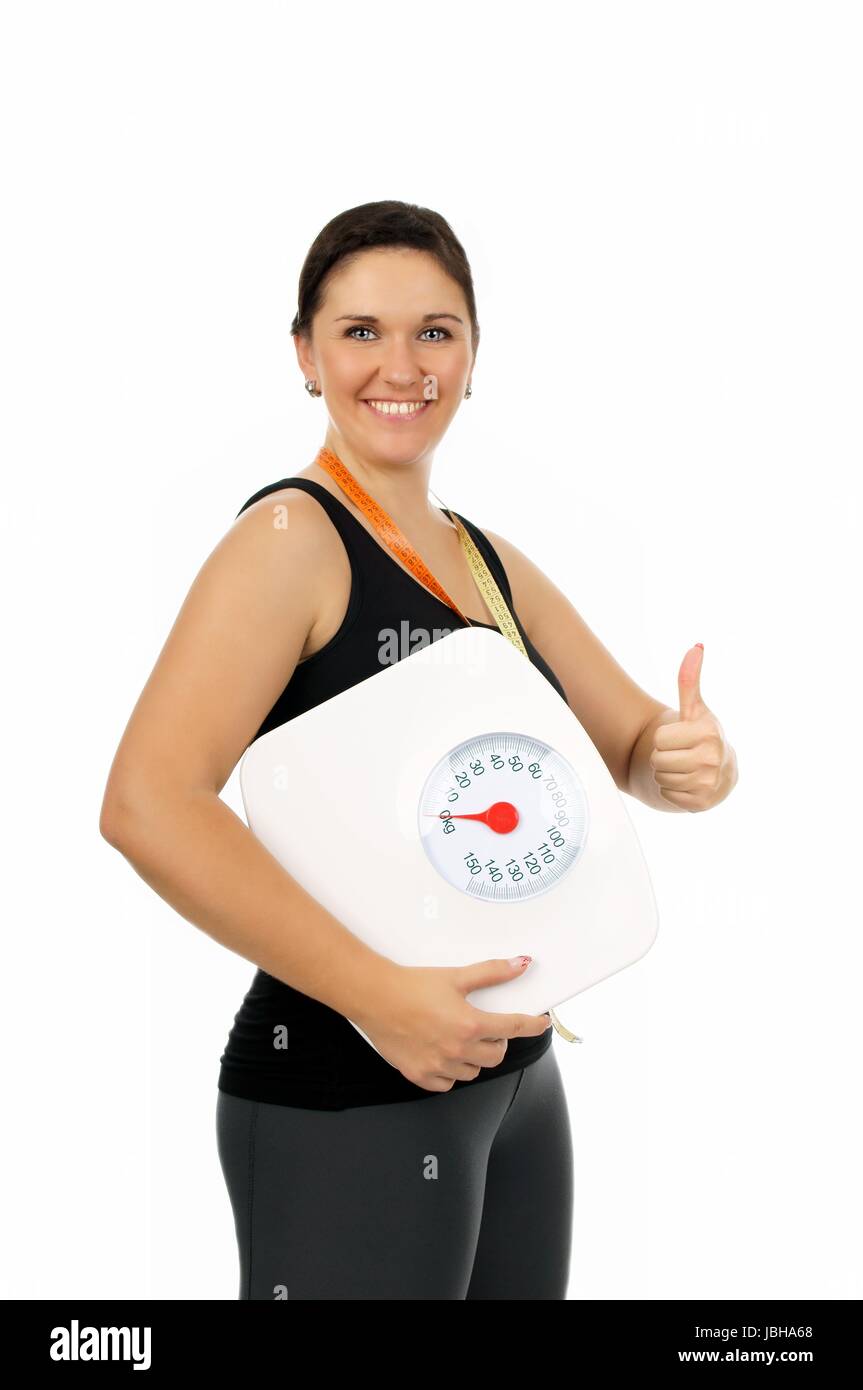 young woman with a weight scale Stock Photo - Alamy