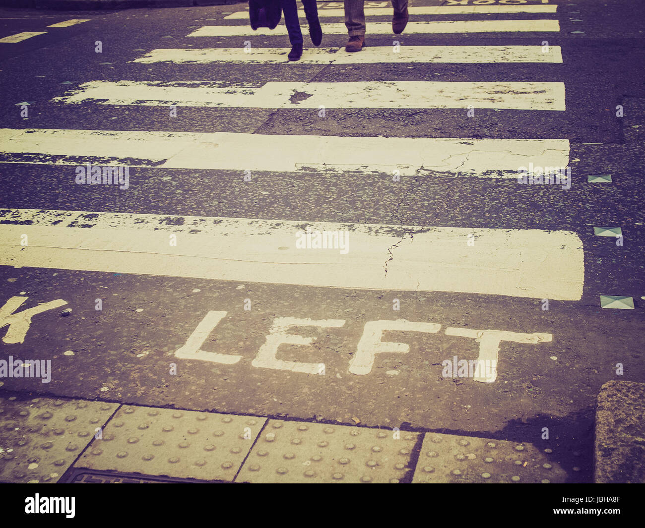 Vintage retro looking Look Left sign in a London street Stock Photo - Alamy