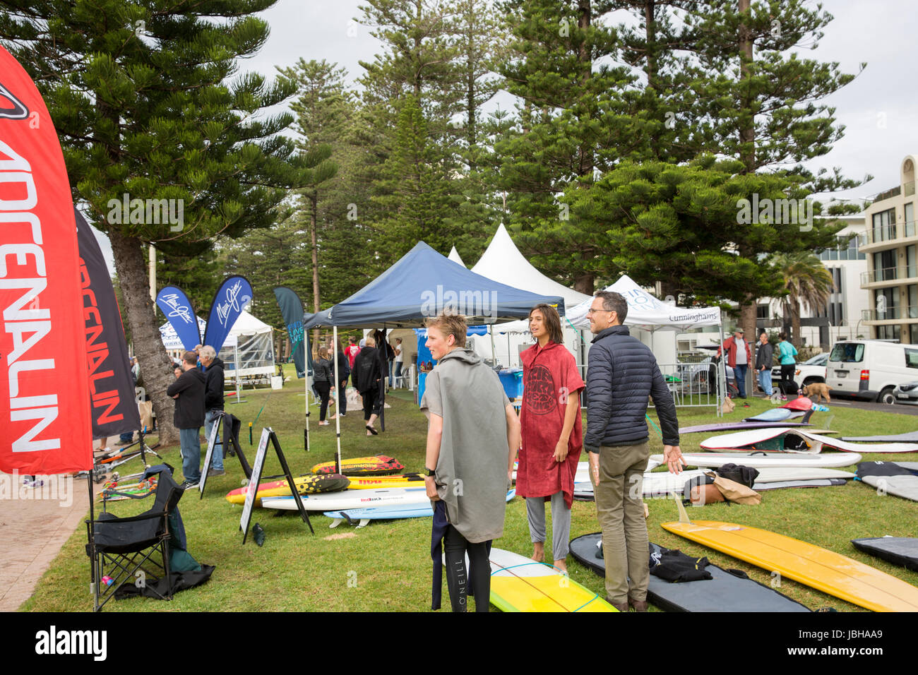 Surfing competition with sponsors flags and banners at Manly beach ...