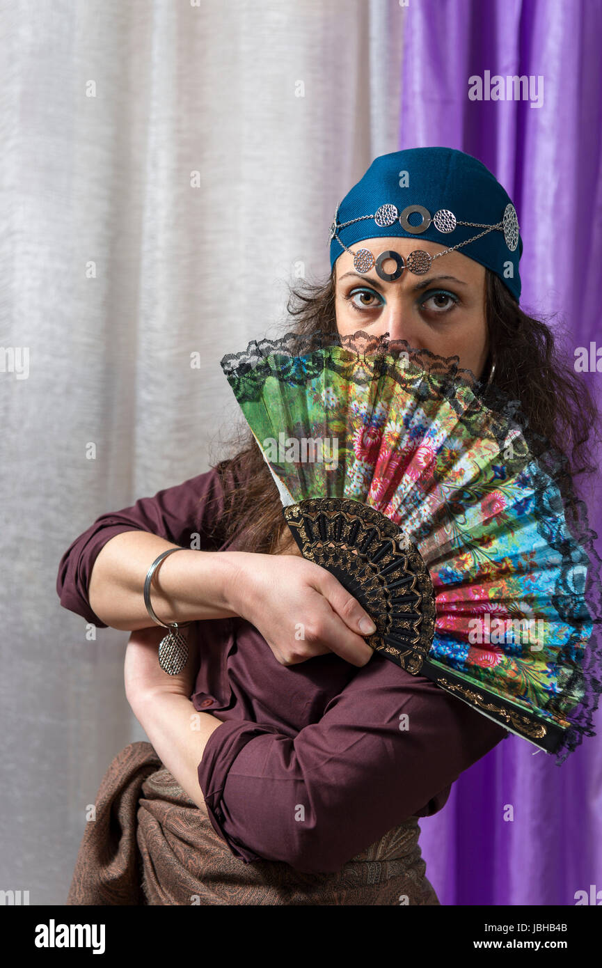 Face behind fan hi-res stock photography and images - Alamy