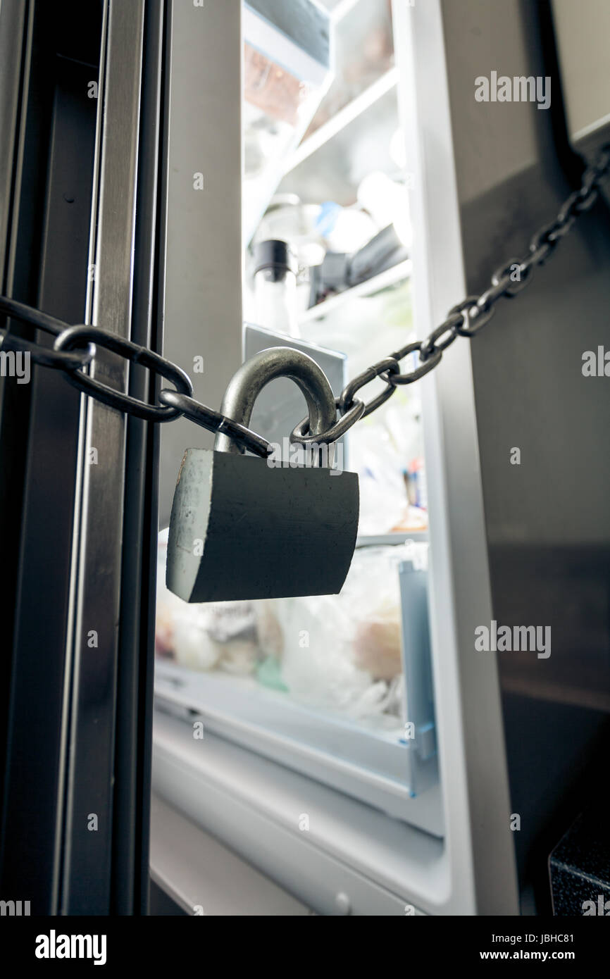 Closeup photo of lock hanging on refrigerator Stock Photo - Alamy