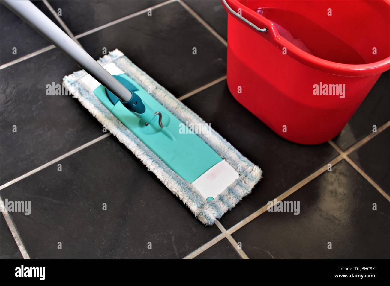 An Image of cleaning a floor Stock Photo - Alamy