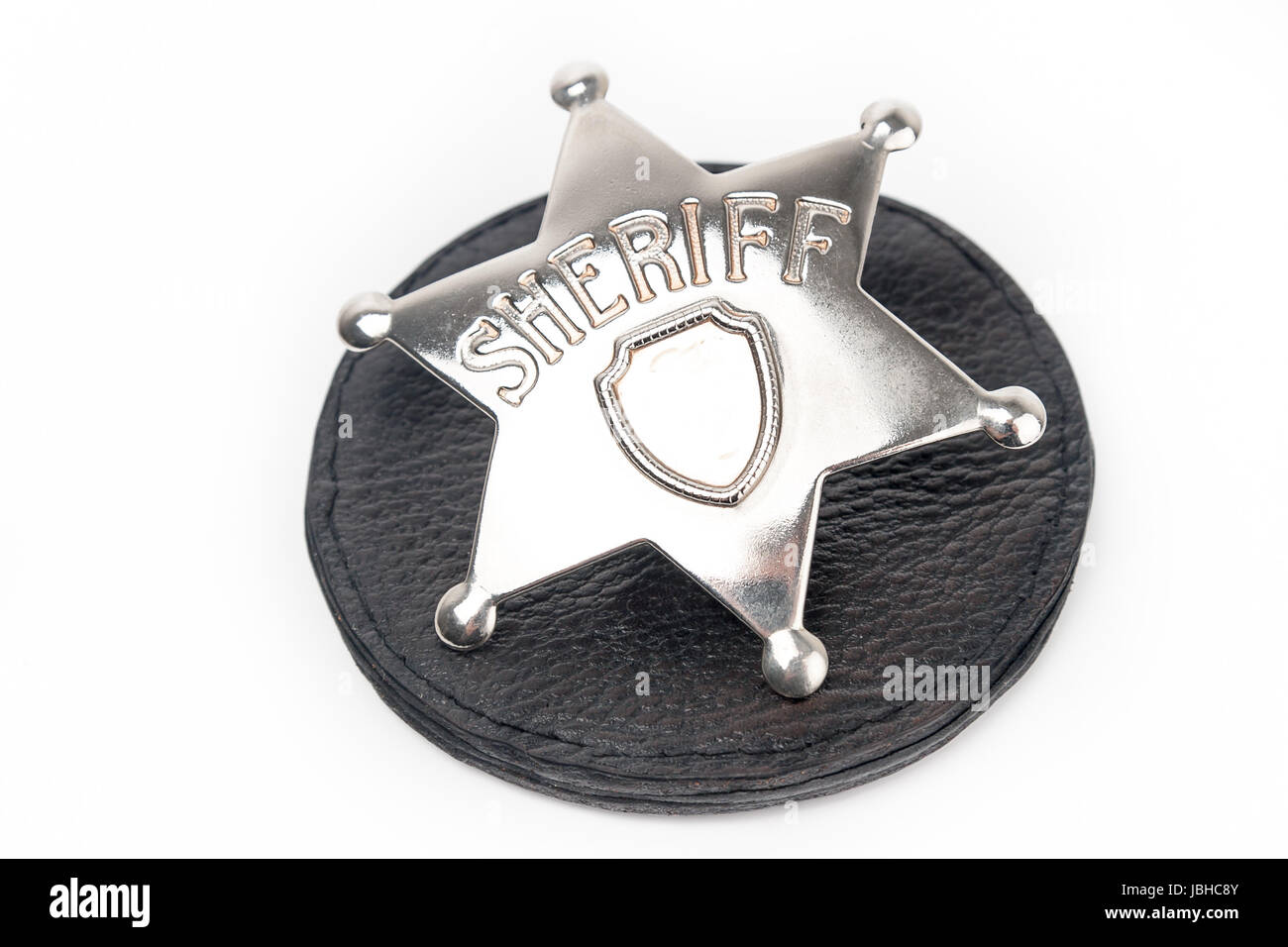 Sheriff's badge isolated on white background Stock Photo - Alamy