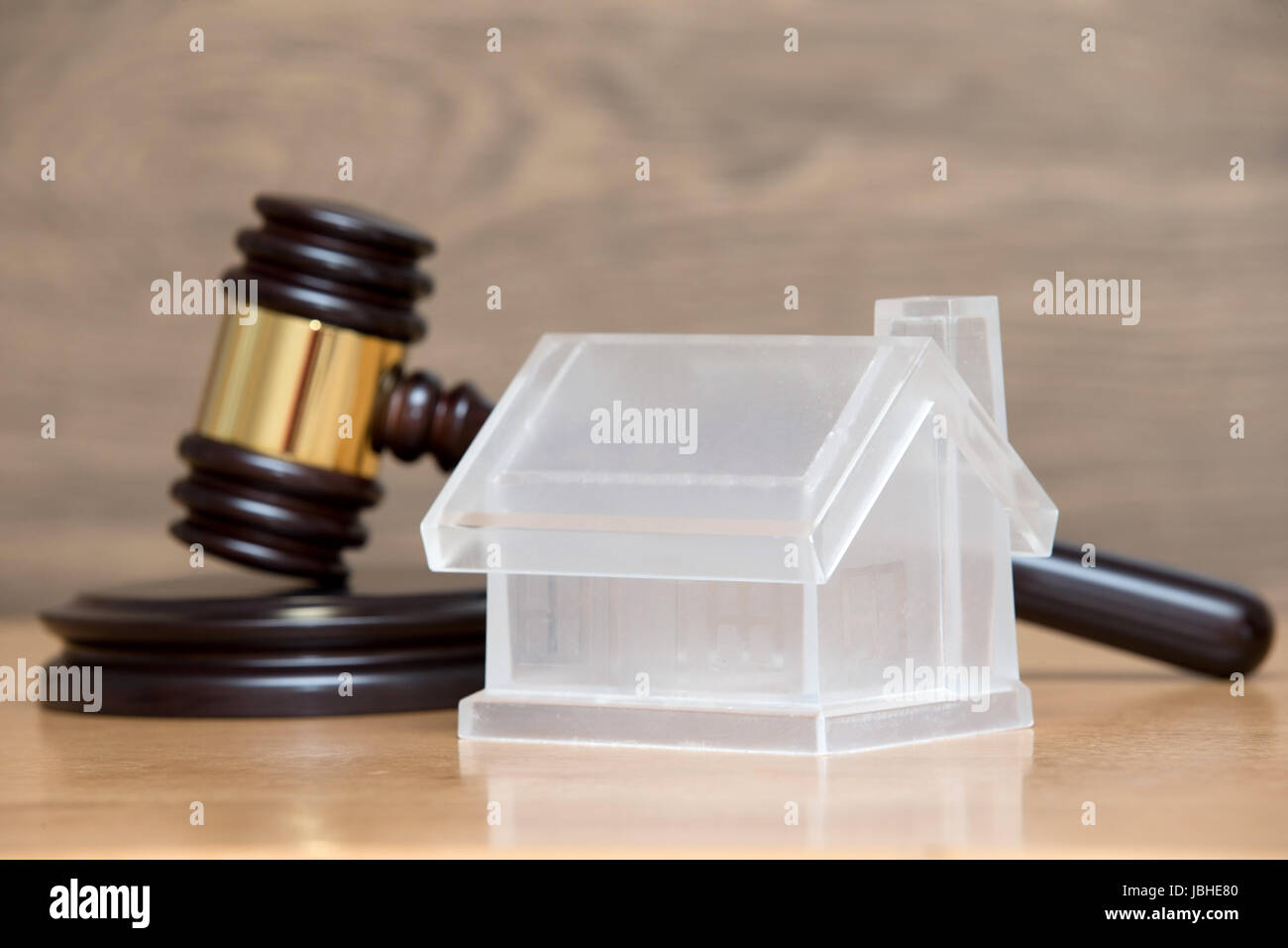 house model and a brown gavel Stock Photo - Alamy