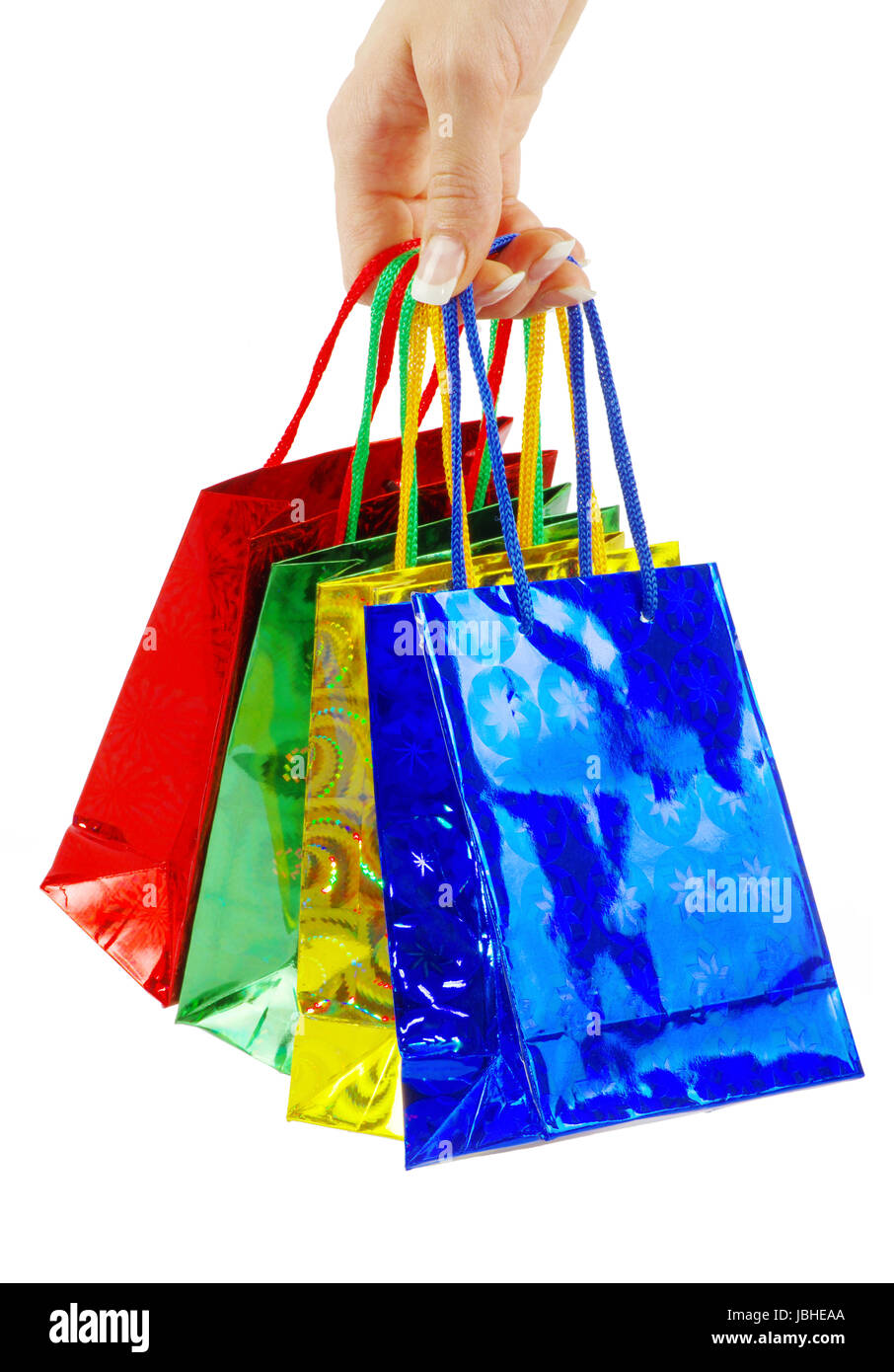 colorful shopping bags set in woman's hand isolated on white Stock ...