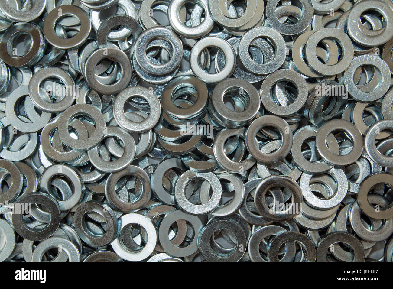 Metal washers in a pile close up from an overhead perspective Stock ...
