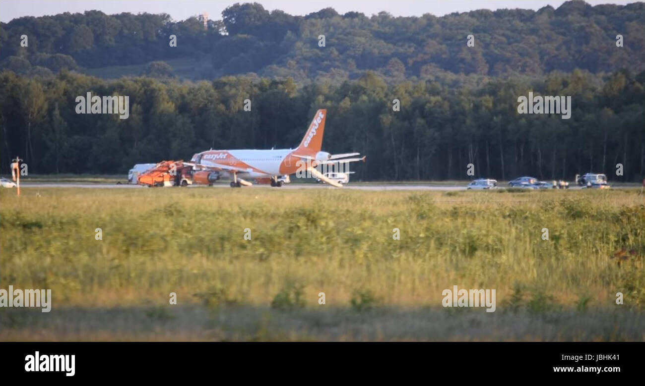 A video still shows the Easyjet airplane with its emergency slide down ...