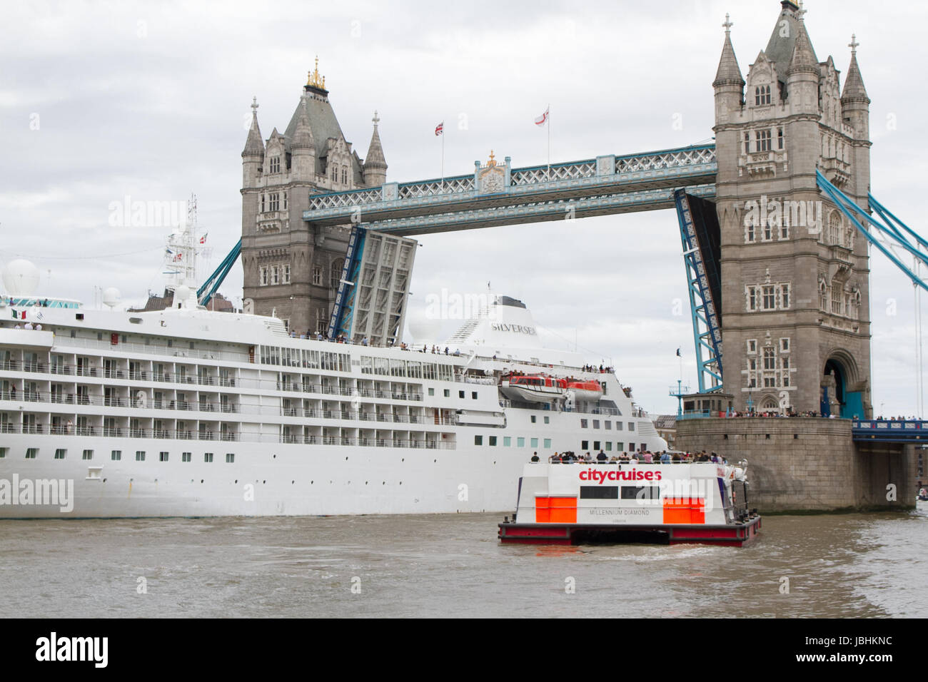 London UK. 11th June 2017. Tower Bridge lifts its draw bridge to allow ...