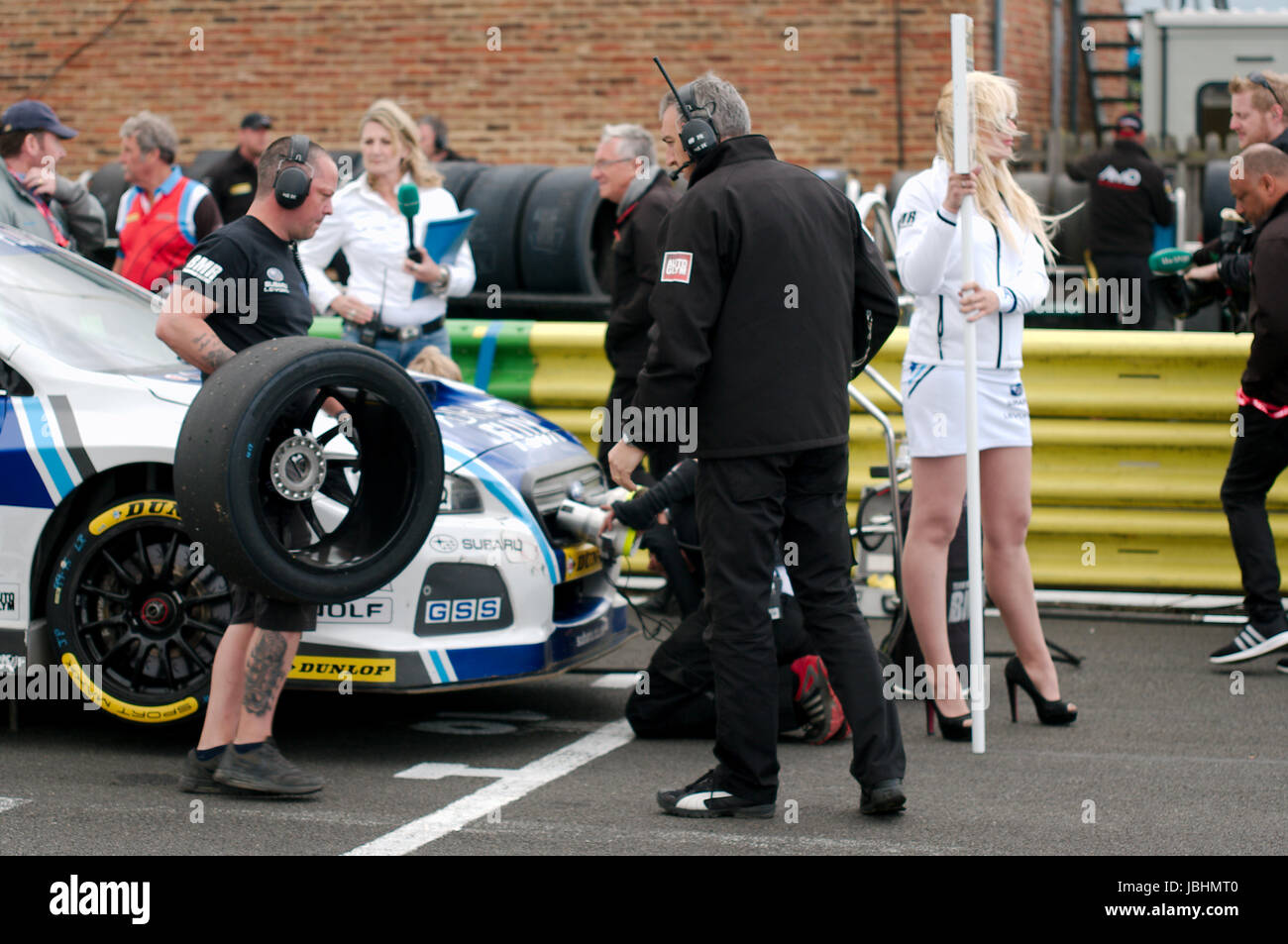 Croft Circuit, England, 11th June 2017. Mechanics working on the car of ...