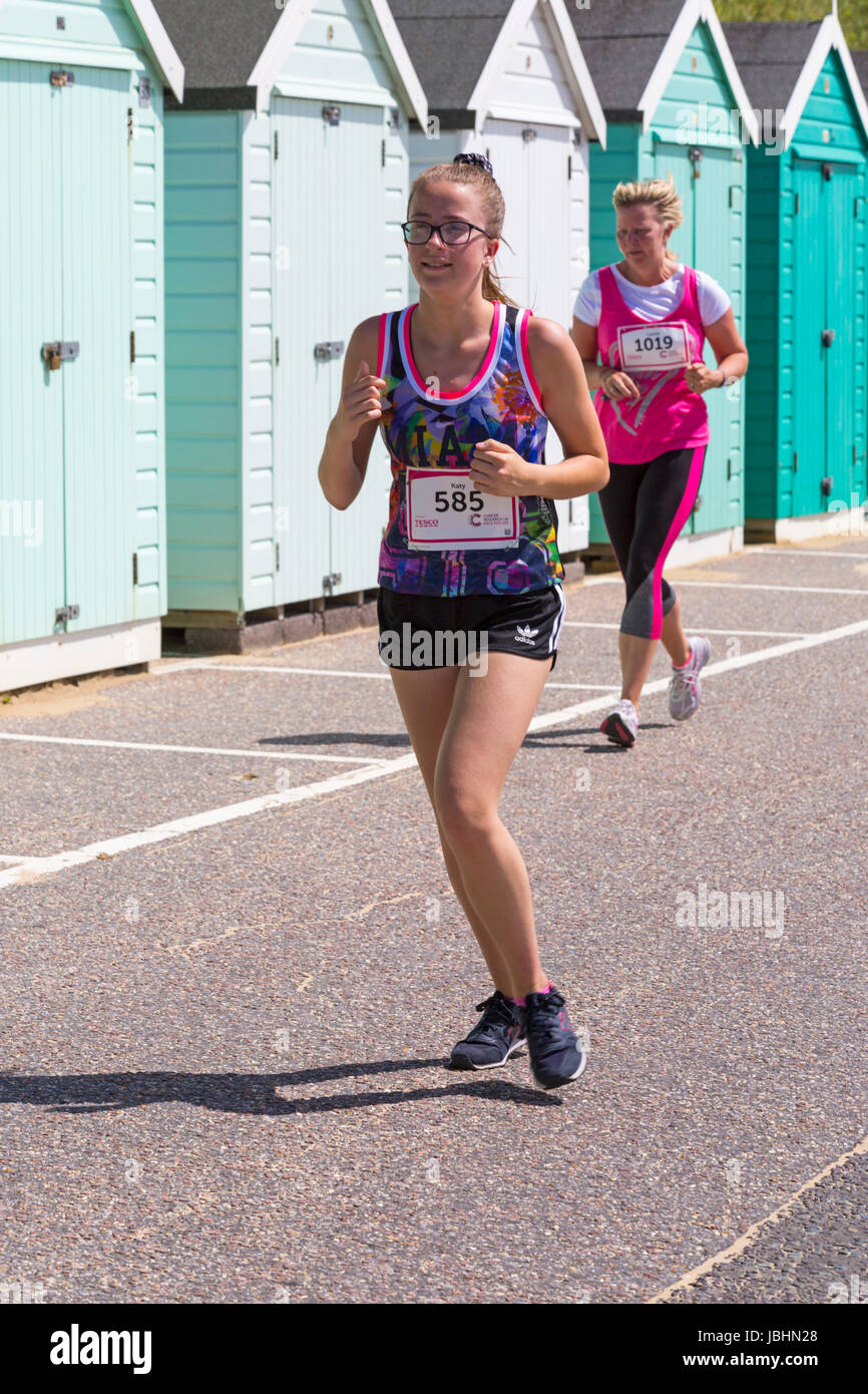 Bournemouth, UK. 11th June, 2017. Hundreds of women dressed in pink ...