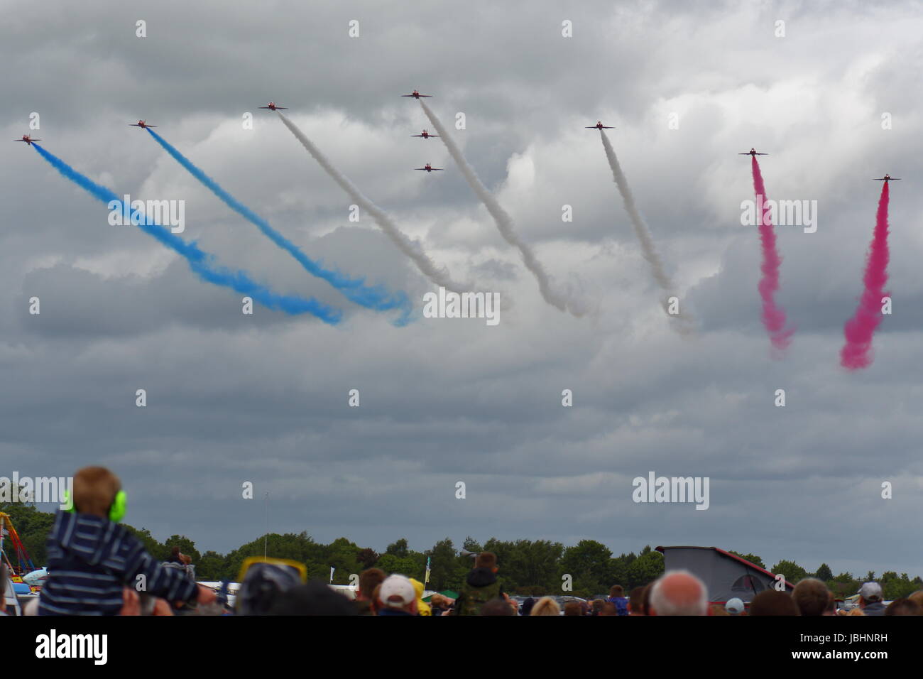 RAF Cosford, Shropshire, UK. 11th June, 2017. The Red Arrows display ...