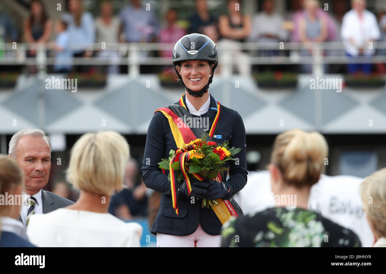 Balve, Germany. 11th June, 2017. Showjumper Simone Blum is pleased with ...