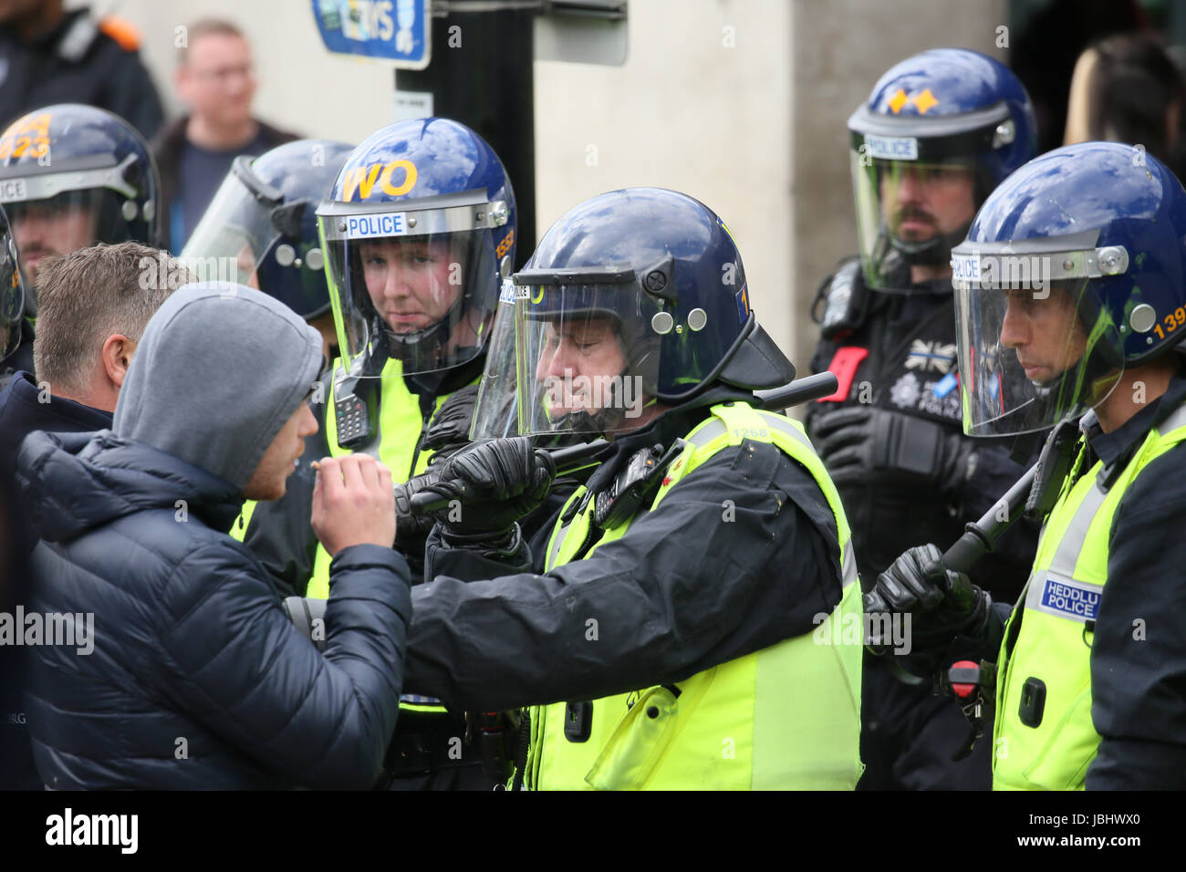 Manchester, UK. 11th June, 2017. Police officers with raised batons in ...