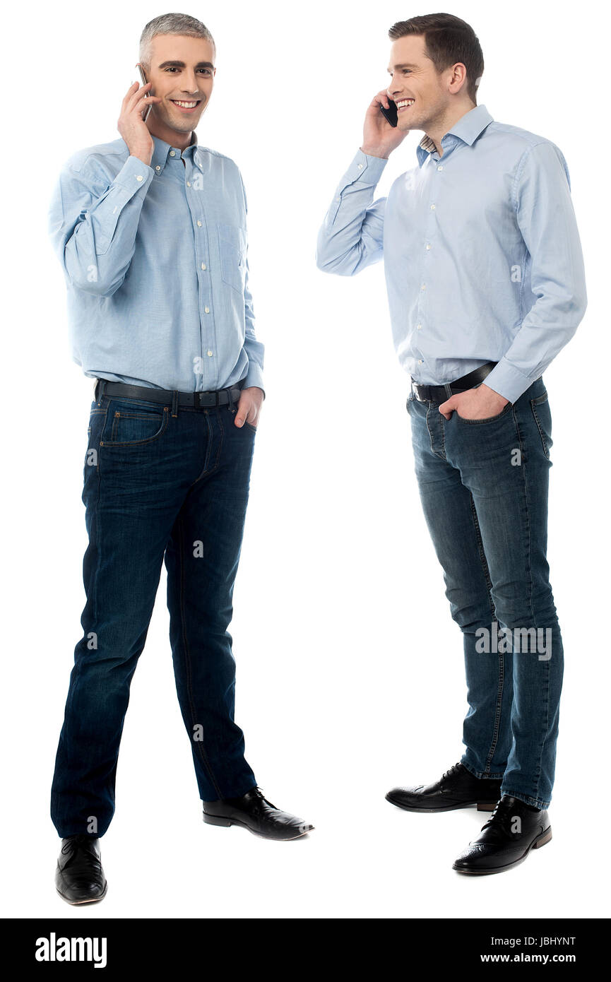 Business people communicating through cellphone Stock Photo - Alamy