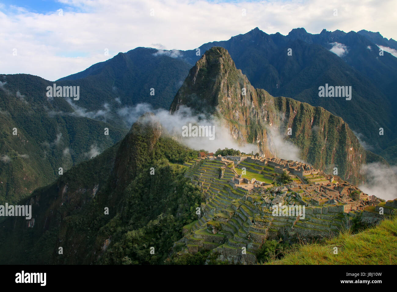 Inca citadel Machu Picchu with morning fog, Peru. In 2007 Machu Picchu ...