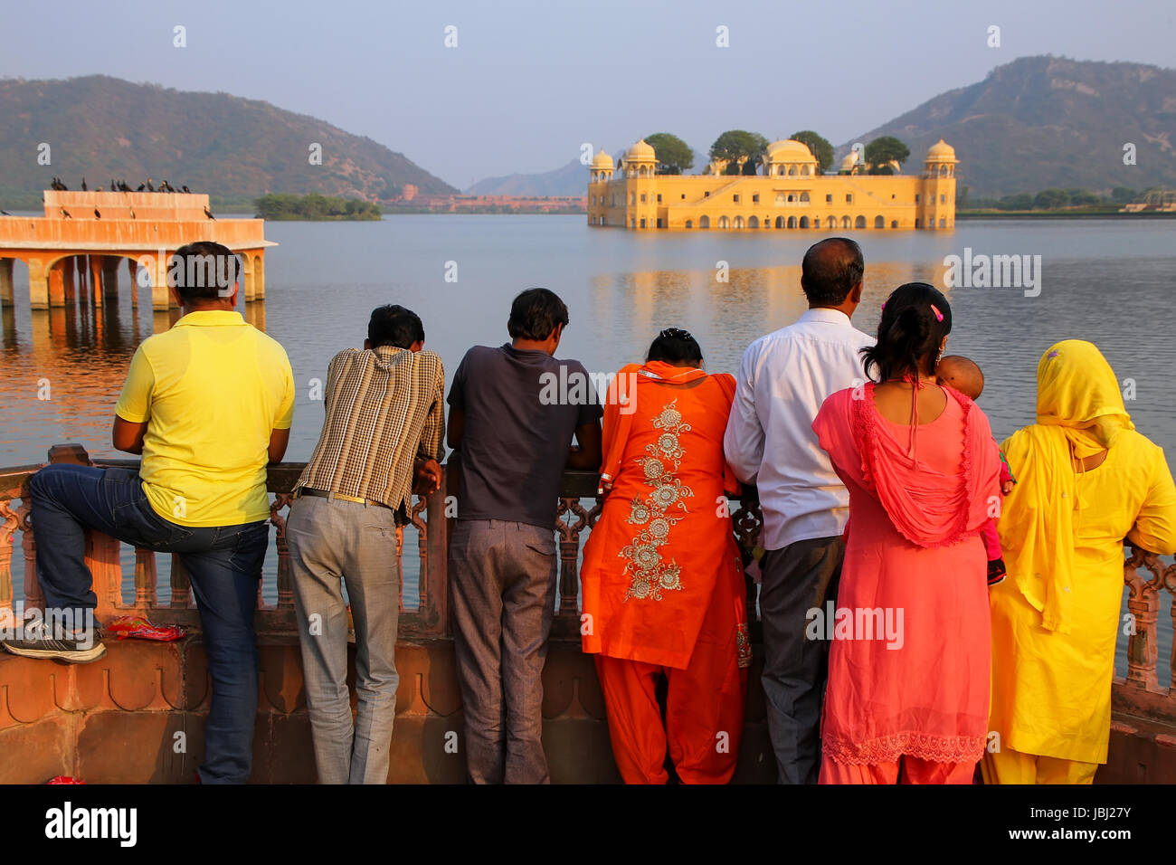People enjoying view of Jal Mahal and Man Sagar Lake in Jaipur ...