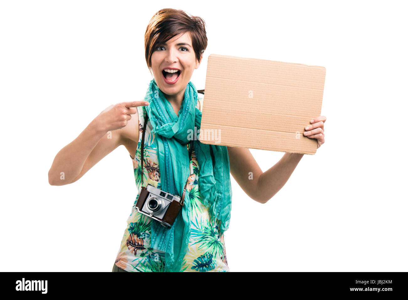 Beautiful woman holding a cardboard, isolated over a white background ...