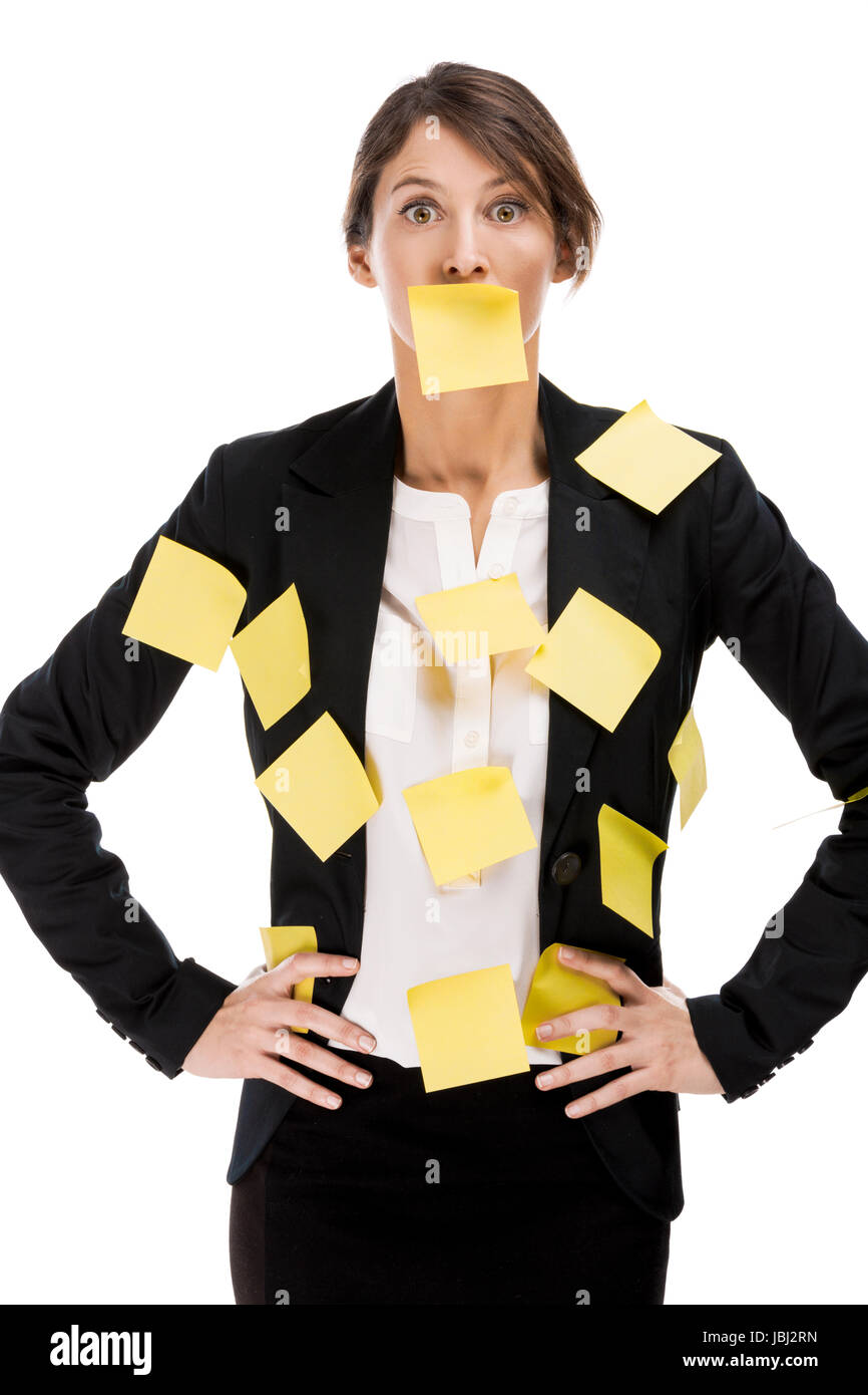 Business woman with yellow paper notes all over the body, isolated over ...